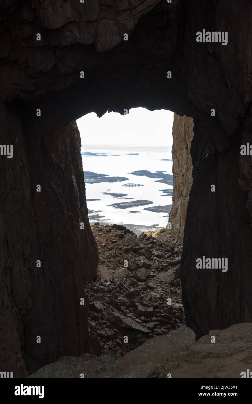 Torghatten is a granite dome in central Norway where waves, frost and ...