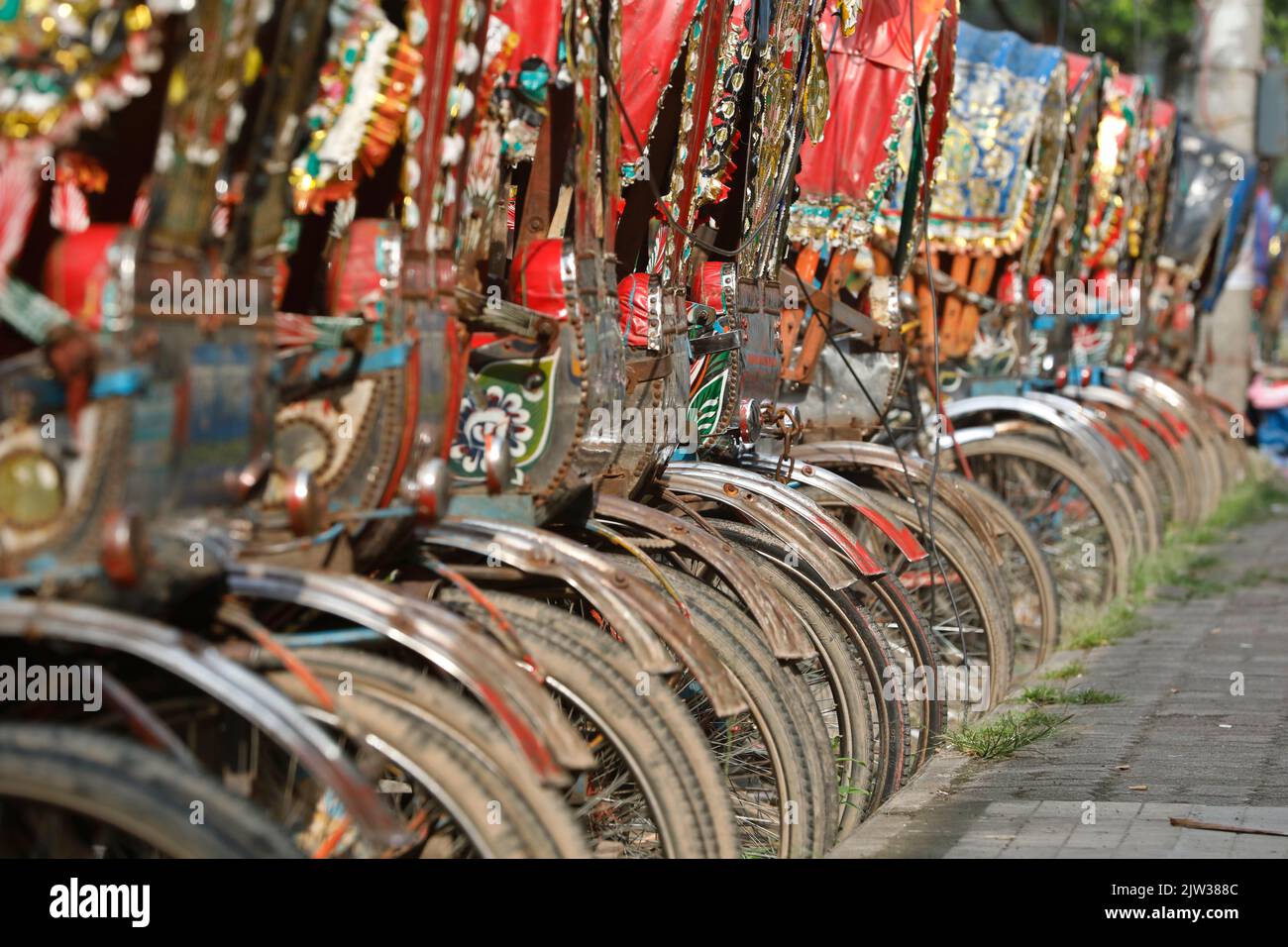 Dhaka, Bangladesh - September 03, 2022: Rows of rickshaws have been ...
