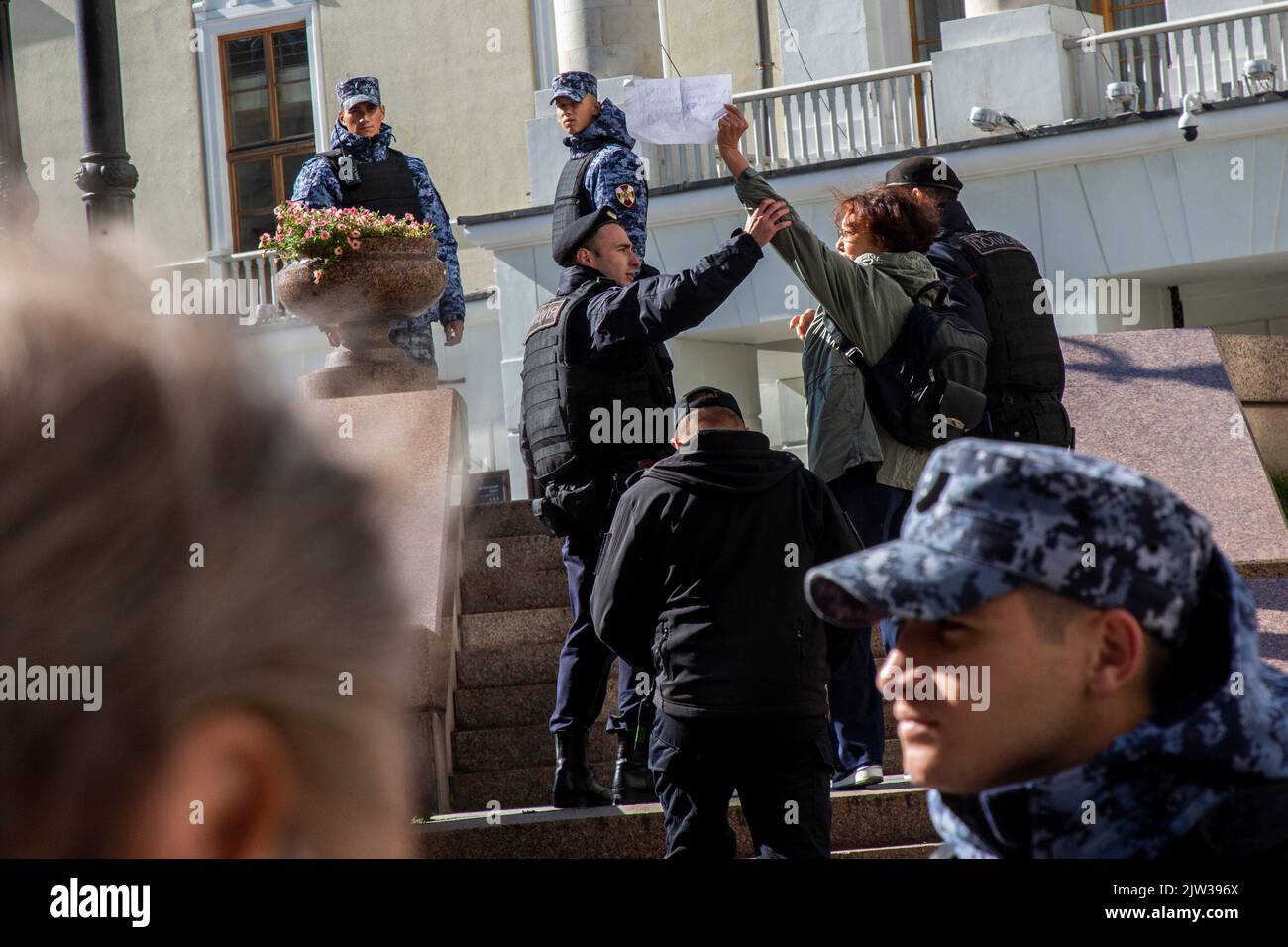 Moscow, Russia. 3rd of September, 2022. Police officers detain a woman ...