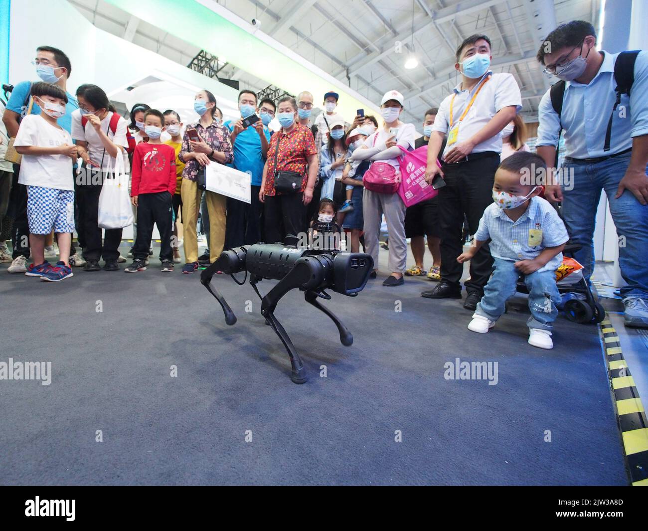 BEIJING, CHINA - SEPTEMBER 3, 2022 - Visitors look at a performance of ...