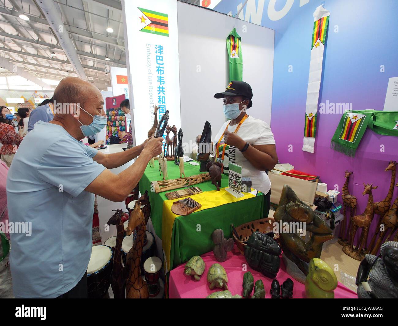 BEIJING, CHINA - SEPTEMBER 3, 2022 - Visitors shop for goods at the ...