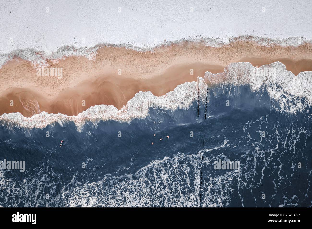 Winter swim in cold Baltic sea for improve health, aerial view of ...