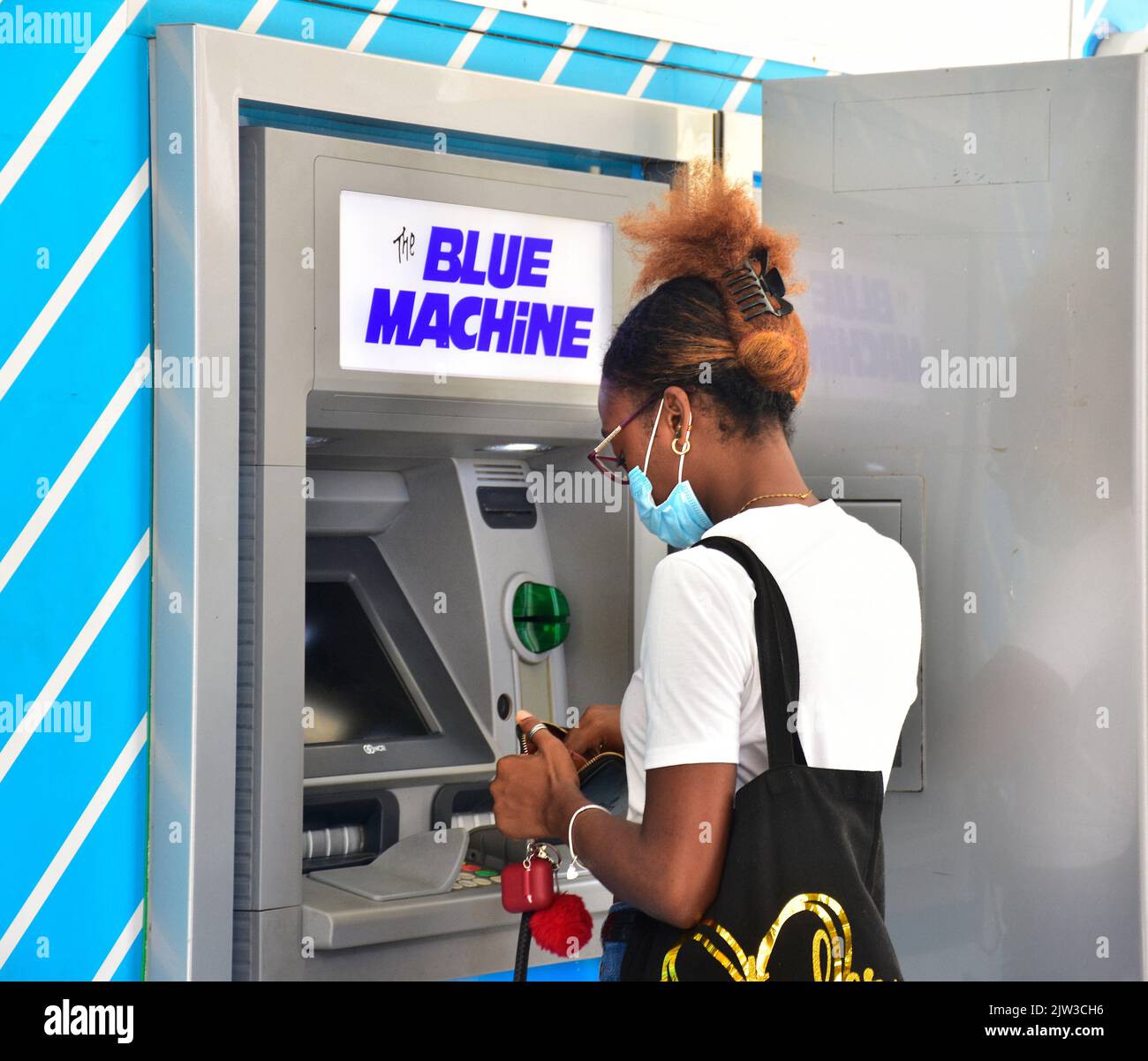 Using an outdoor atm machine in barbados hi-res stock photography and ...