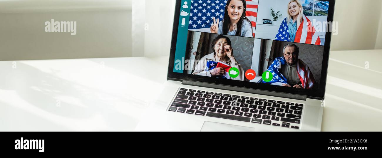 Back view of business woman talking to her colleagues in video ...