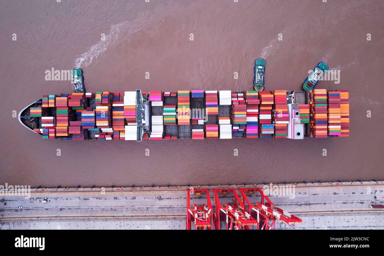 SHANGHAI, CHINA - SEPTEMBER 3, 2022 - A container ship docks slowly to ...