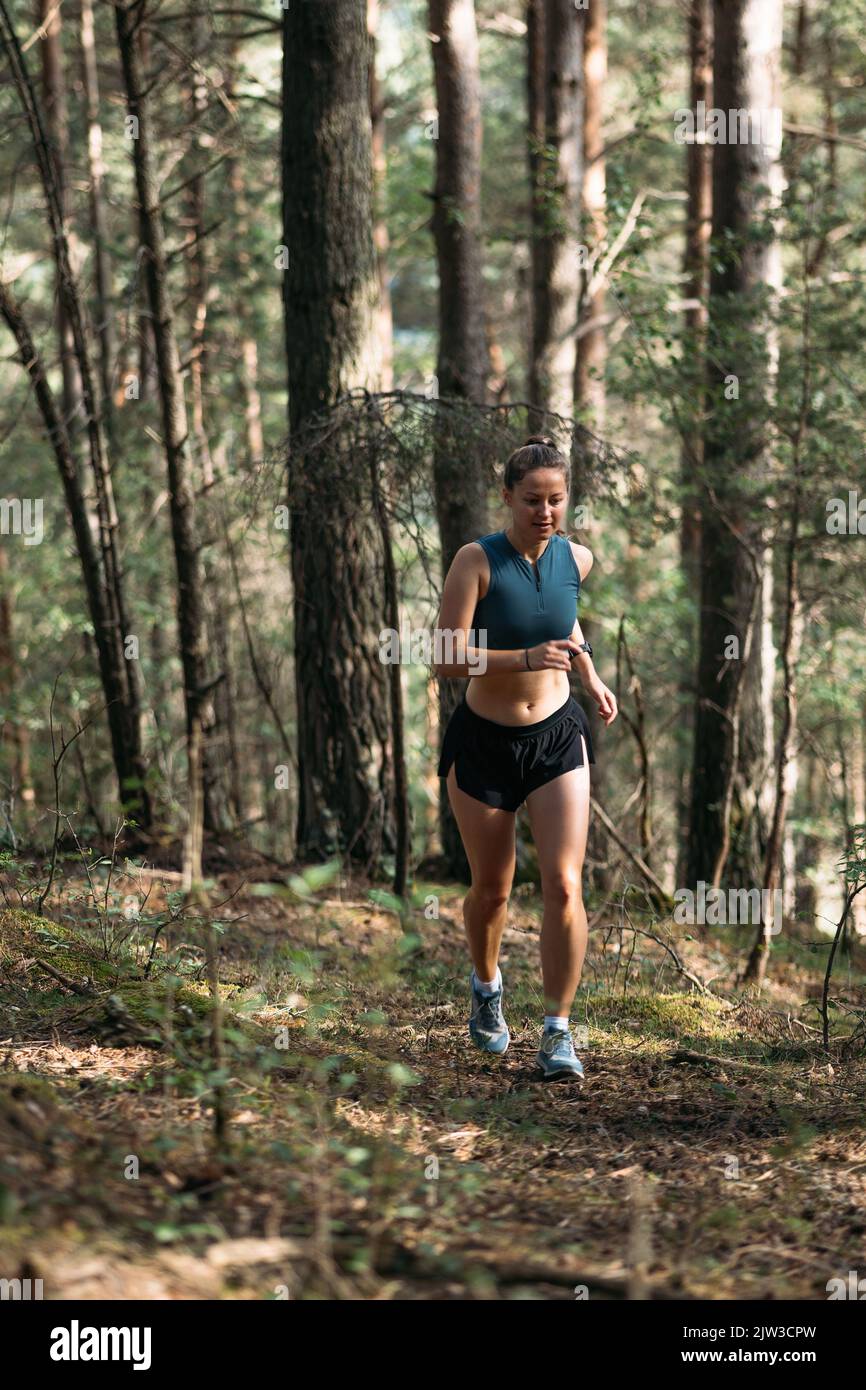 Woman trail runner running hi-res stock photography and images - Alamy