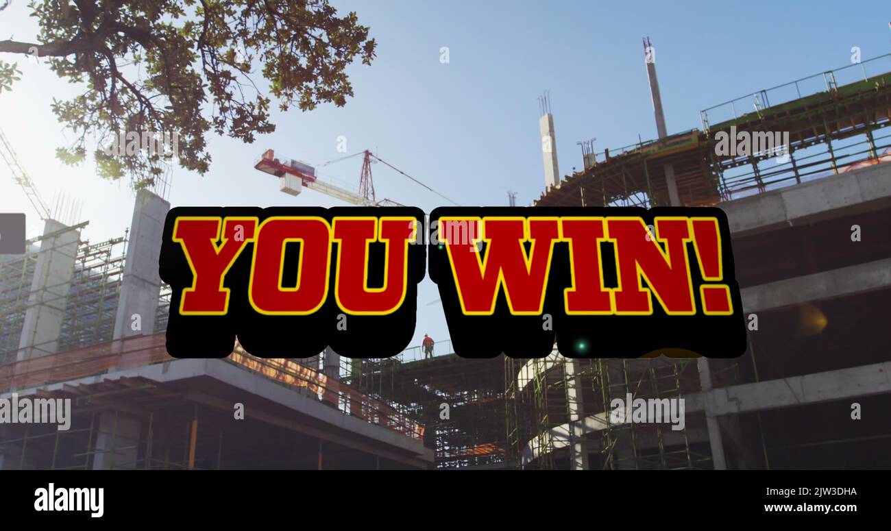 Image of you win text in red, with social media notifications over city ...