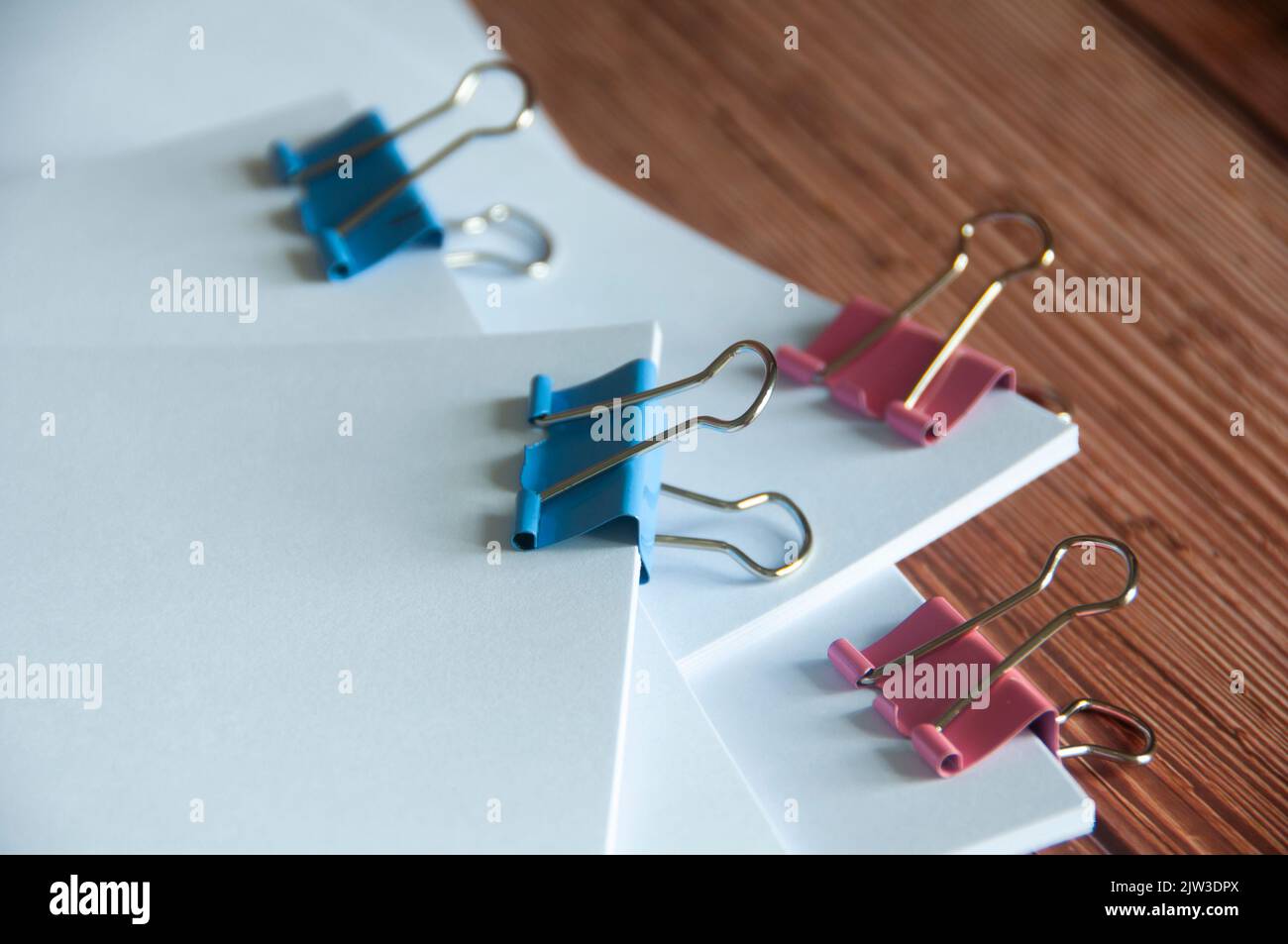 Paper stack of pile of documents on wooden desk. Copy space and ...