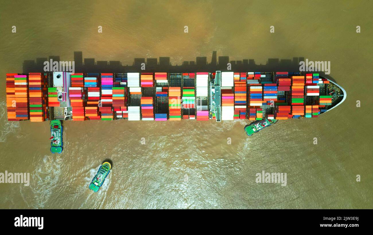SHANGHAI, CHINA - SEPTEMBER 3, 2022 - A container ship docks slowly to ...