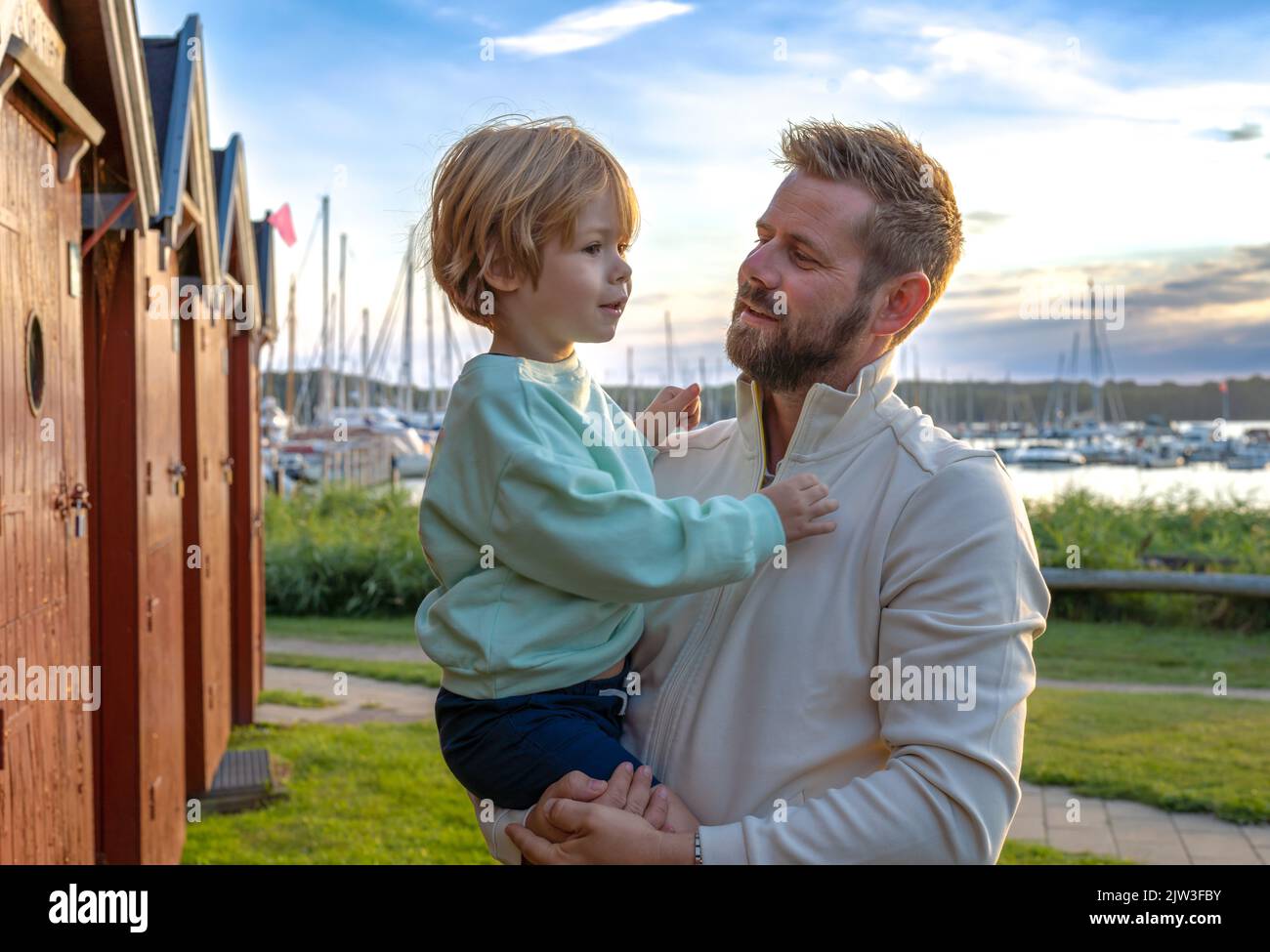 Shot of a father and his little son bonding together outdoors Stock ...