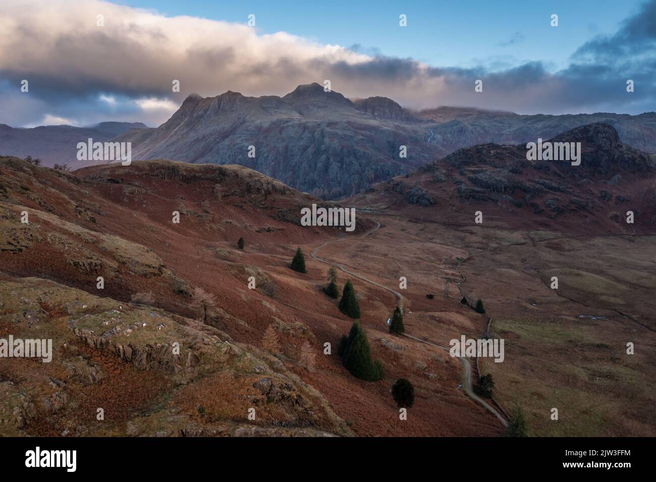 Epic aerial drone landscape image of sunrise from Blea Tarn in Lake ...