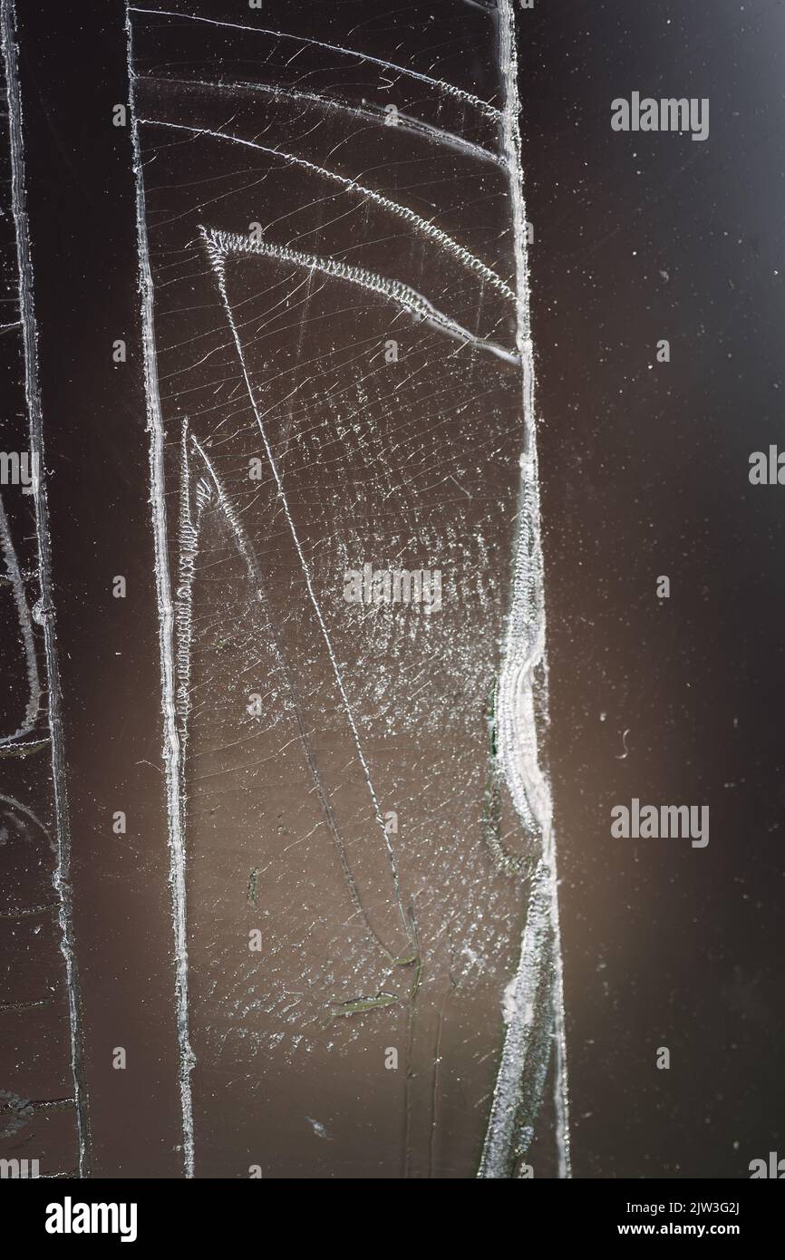 Strip of tape adhesive on a glass surface after being pulled Stock ...