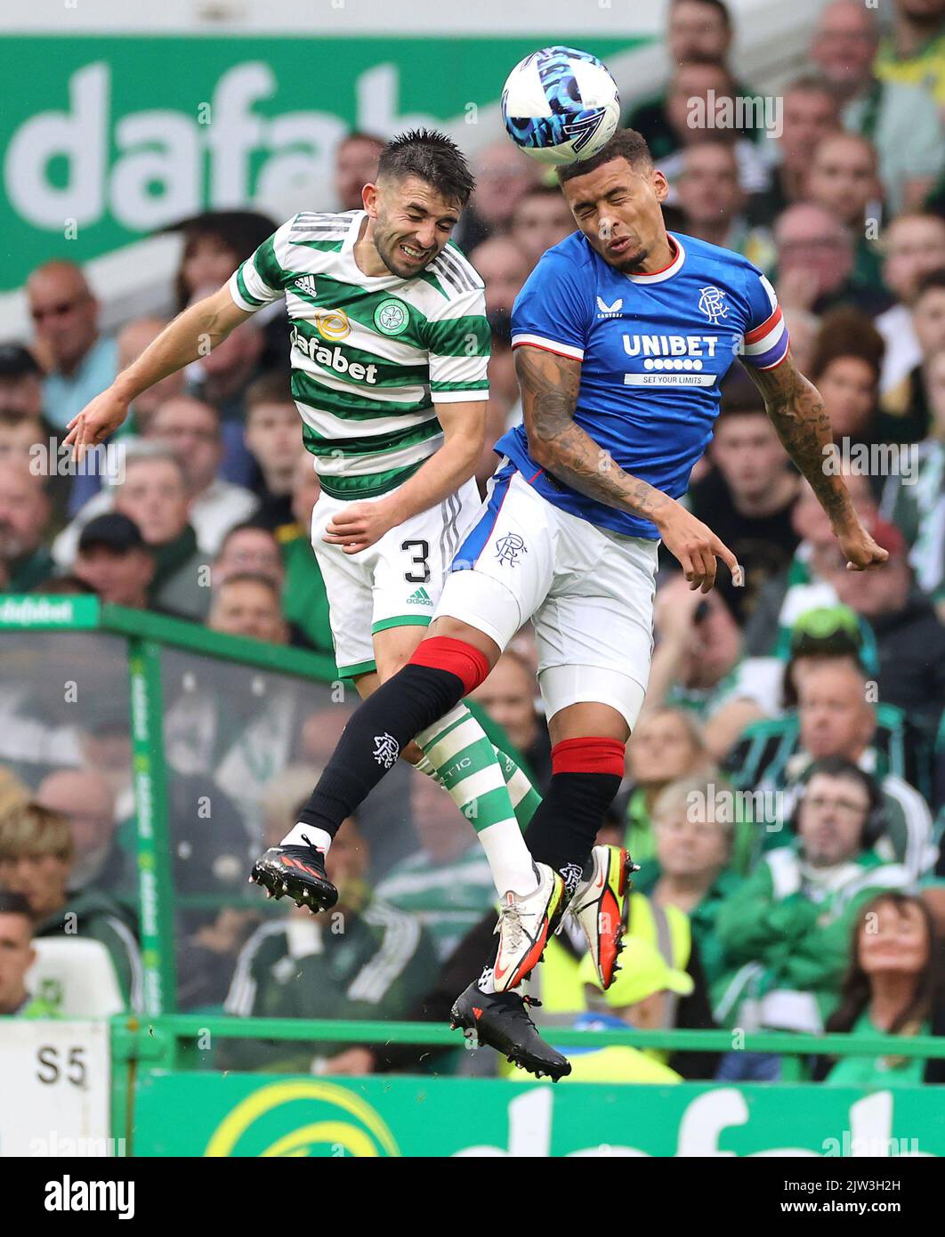 Celtic's Greg Taylor (left) and Rangers' James Tavernier battle for the ...