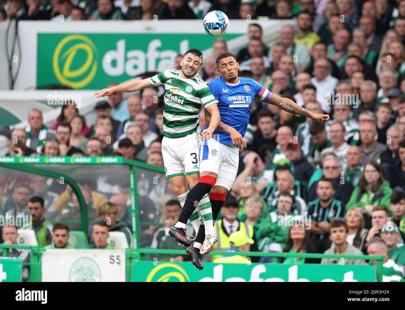 Celtic's Greg Taylor (left) and Rangers' James Tavernier battle for the ...