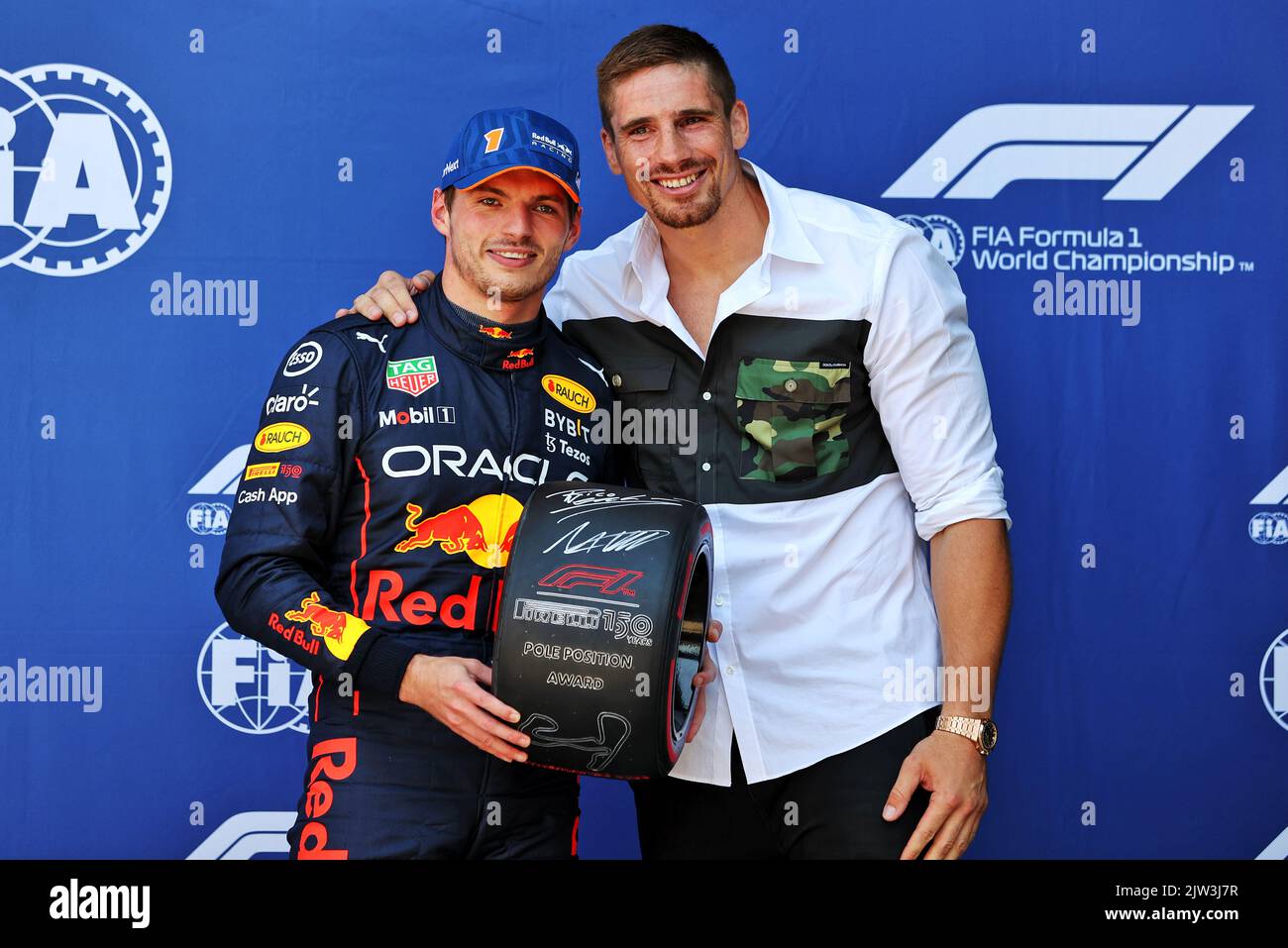 (L to R): Max Verstappen (NLD) Red Bull Racing celebrates his pole ...