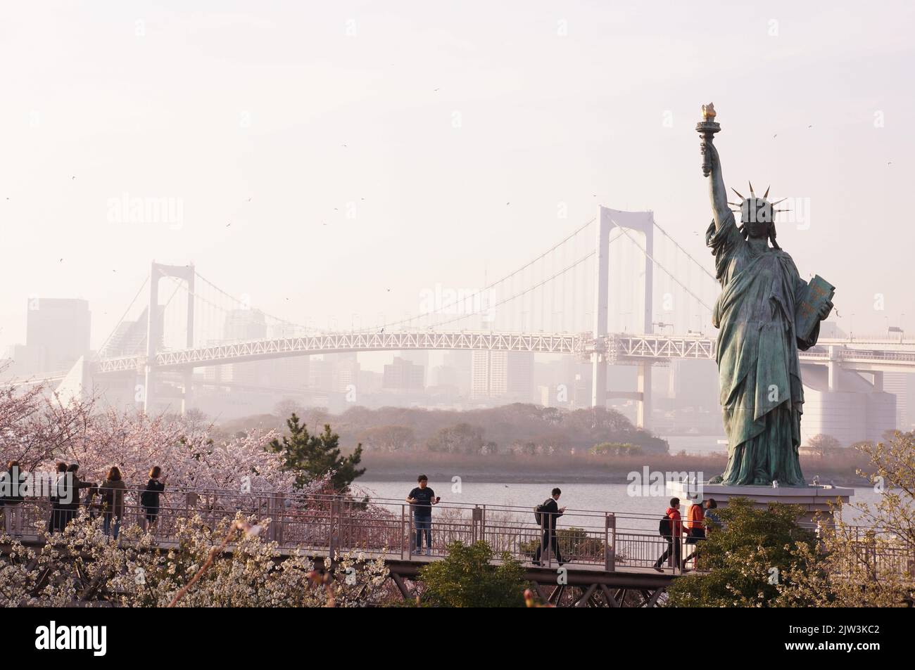 Odaiba's Statue of Liberty and Rainbow Bridge Stock Photo - Alamy