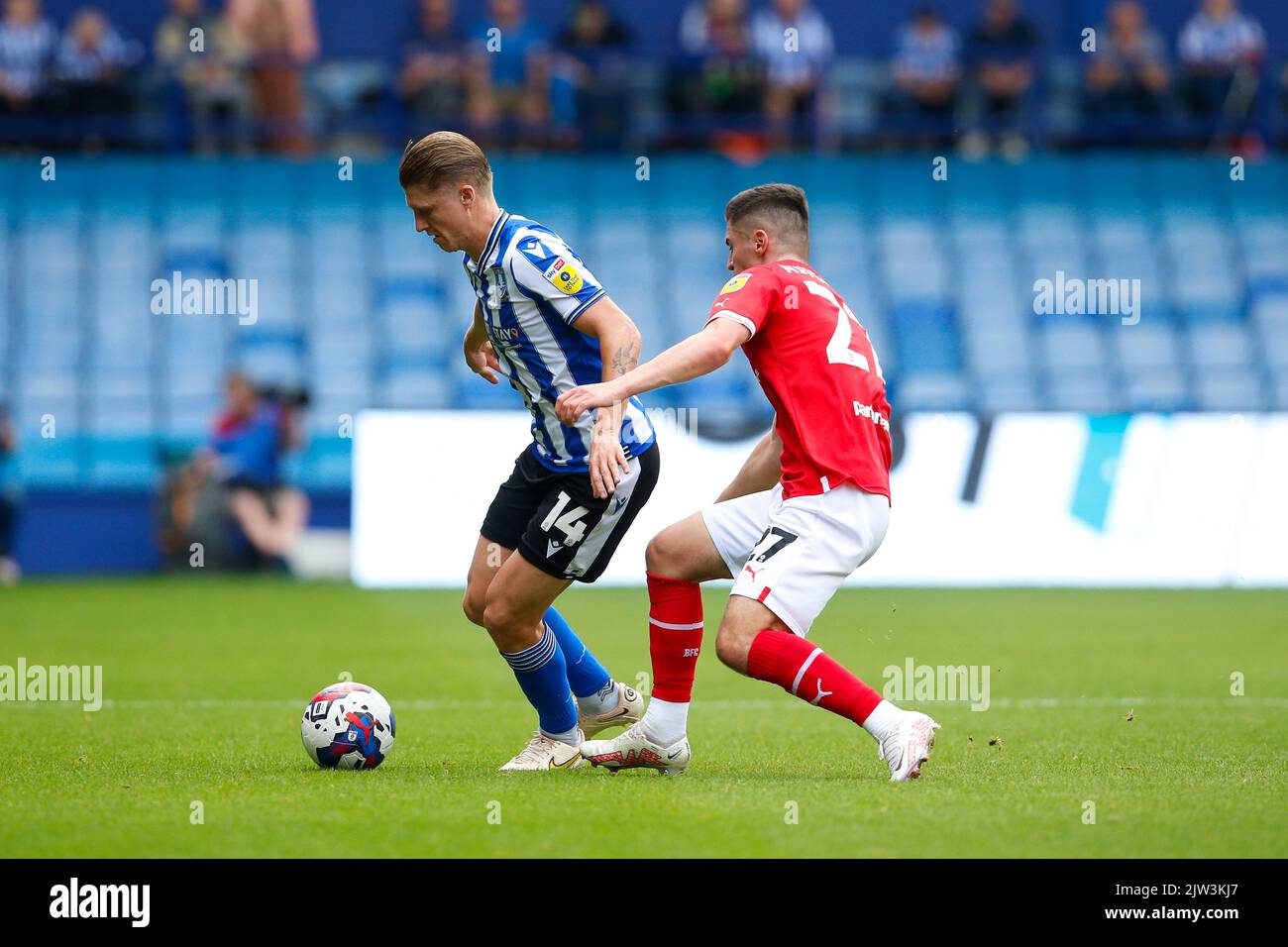 George Byers #14 of Sheffield Wednesday and Jack Aitchison #27 of ...