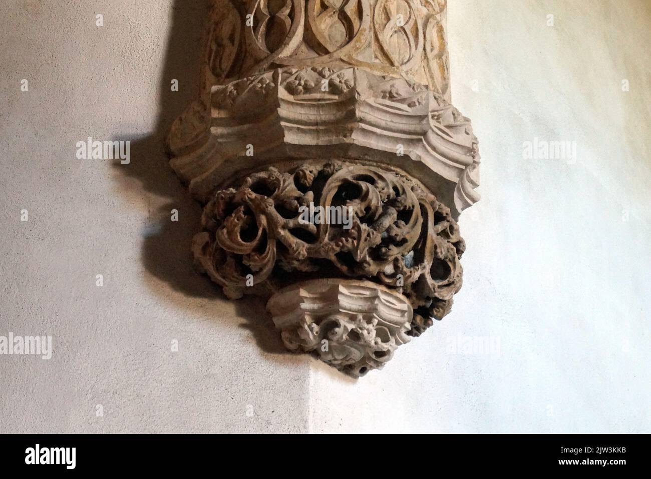 Manueline style architectural detail of the interior, stone carved base ...