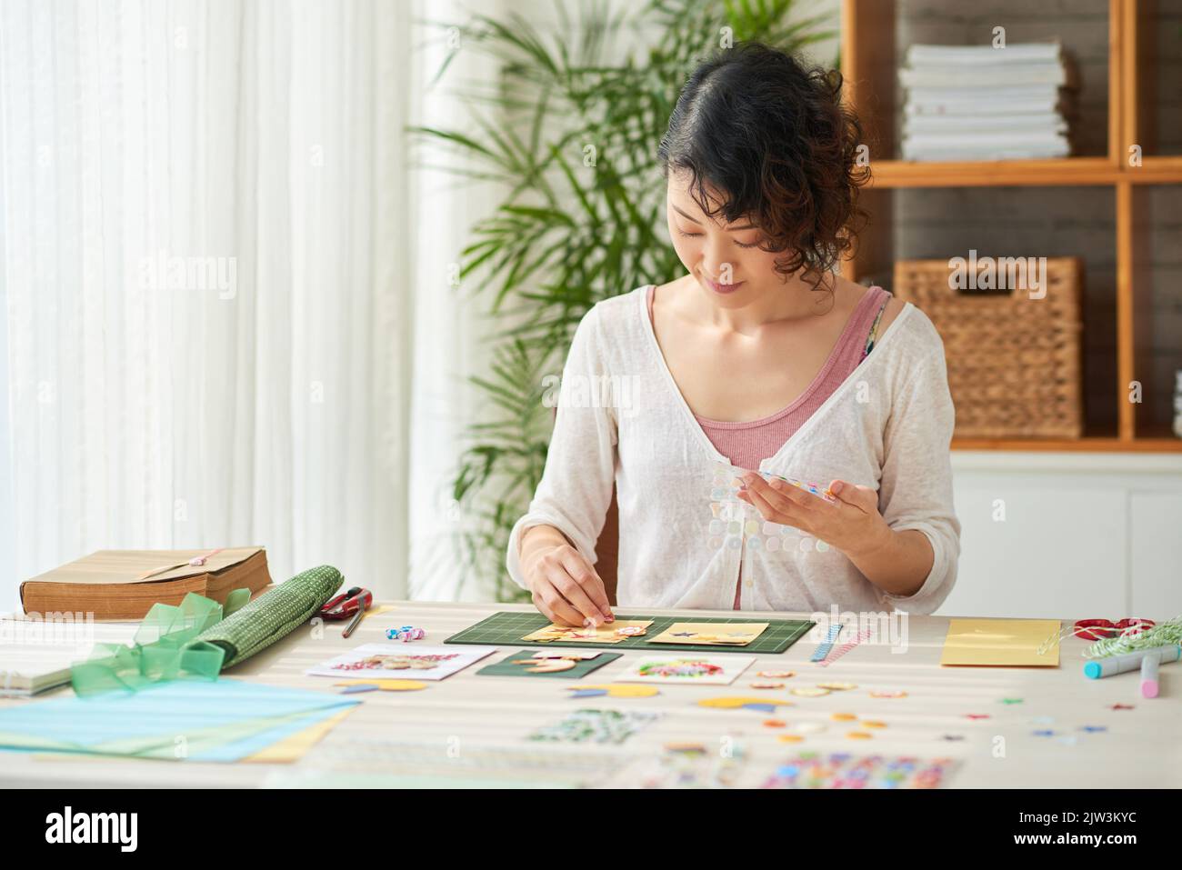 Woman making cards craft hi-res stock photography and images - Alamy