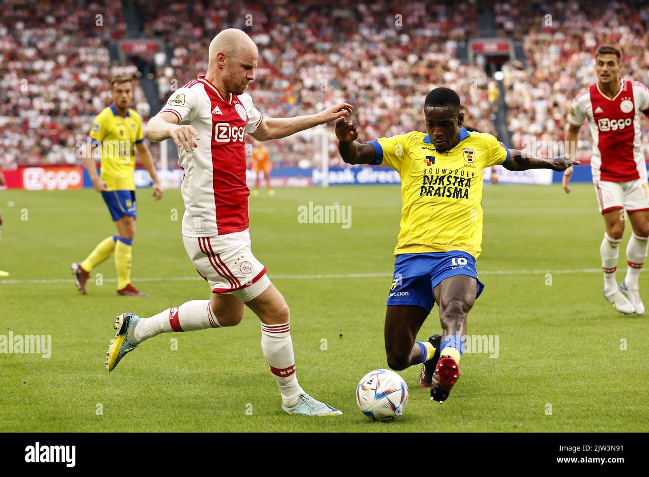AMSTERDAM - (lr) Davy Klaassen of Ajax, Alex Bangura or SC Cambuur Leeuwarden during the Dutch ...