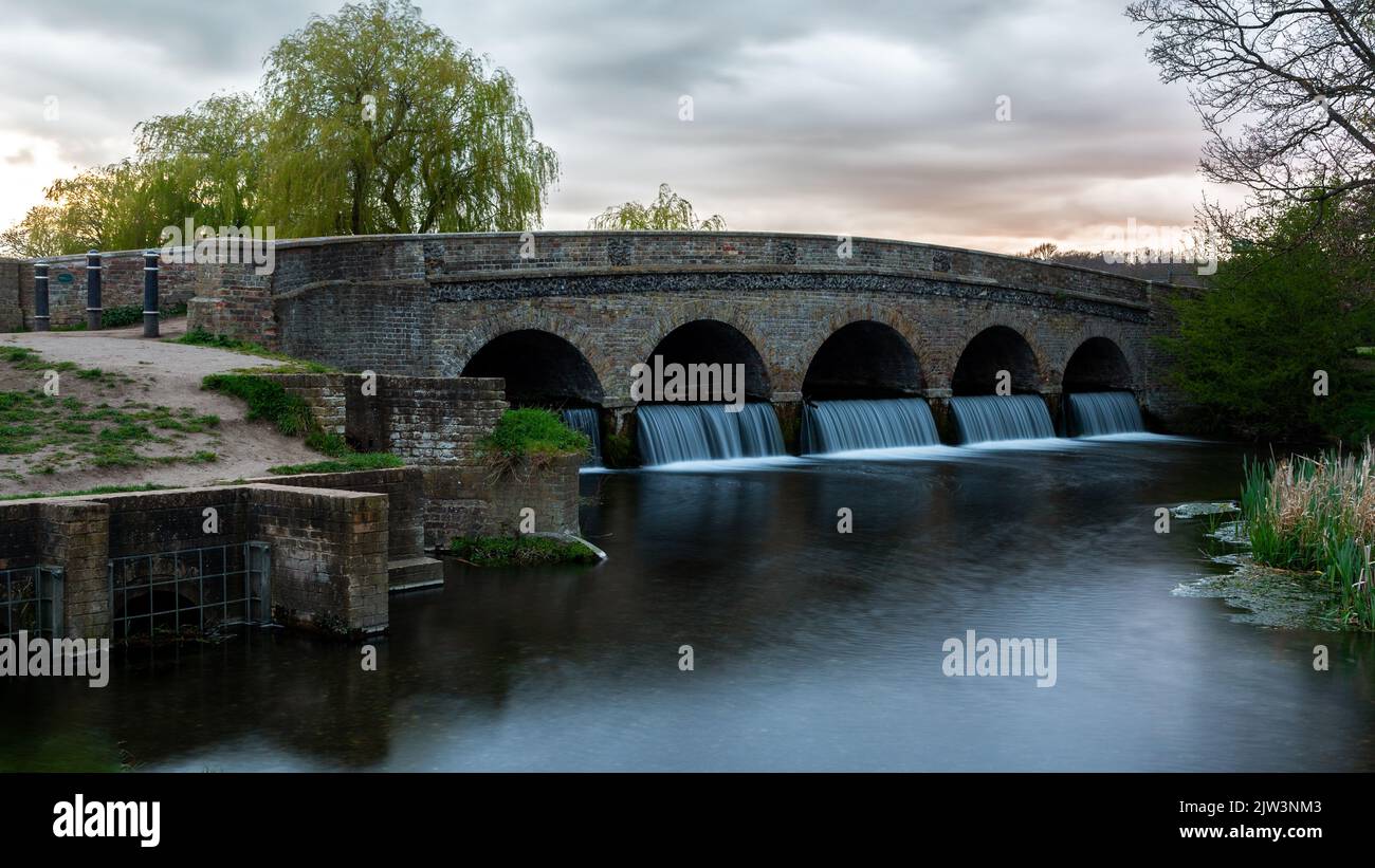 Water flowing out of Five Arches Bridge, Sidcup Stock Photo - Alamy
