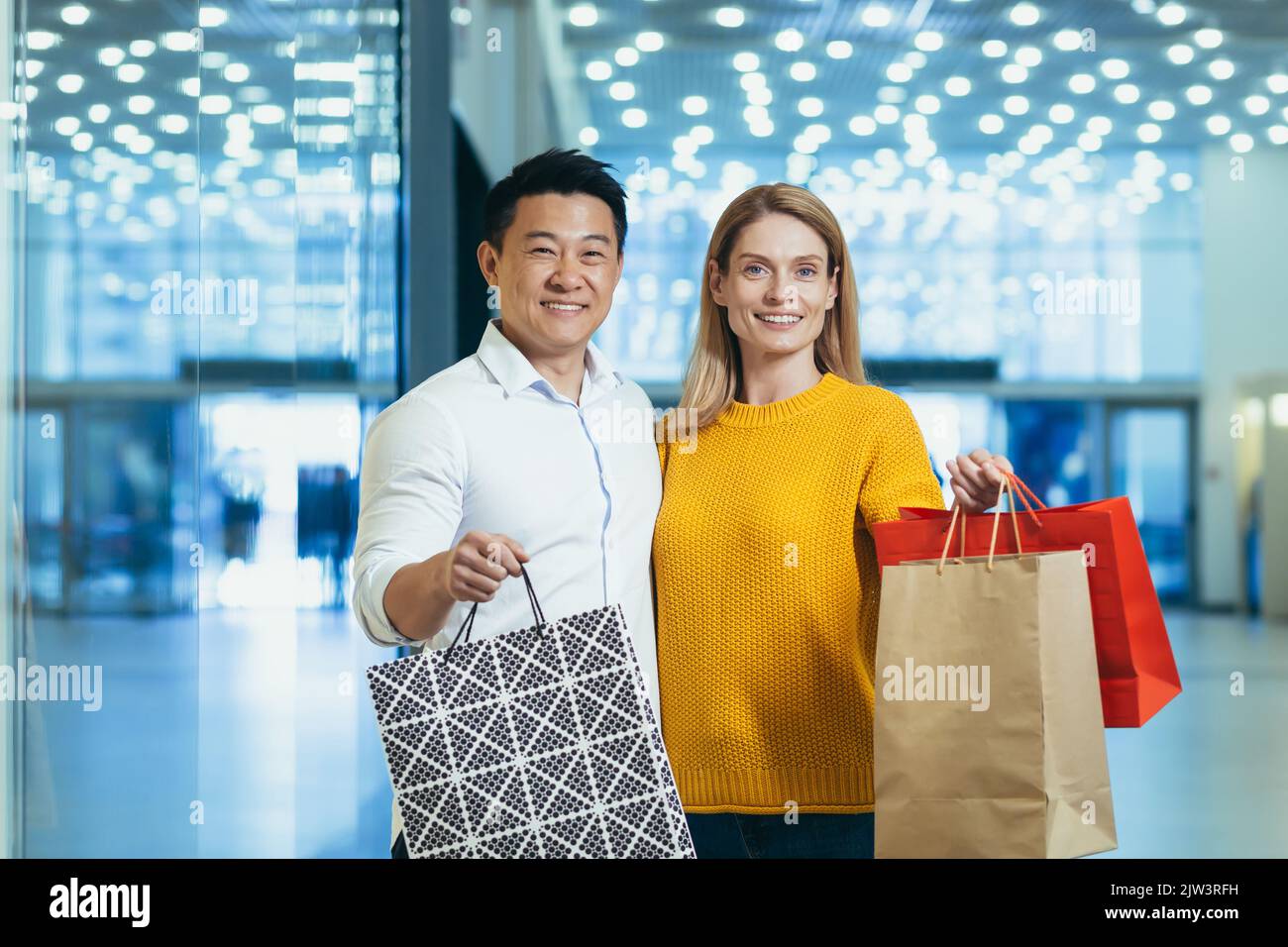 Asian couple shopping mall luxury hi-res stock photography and images ...