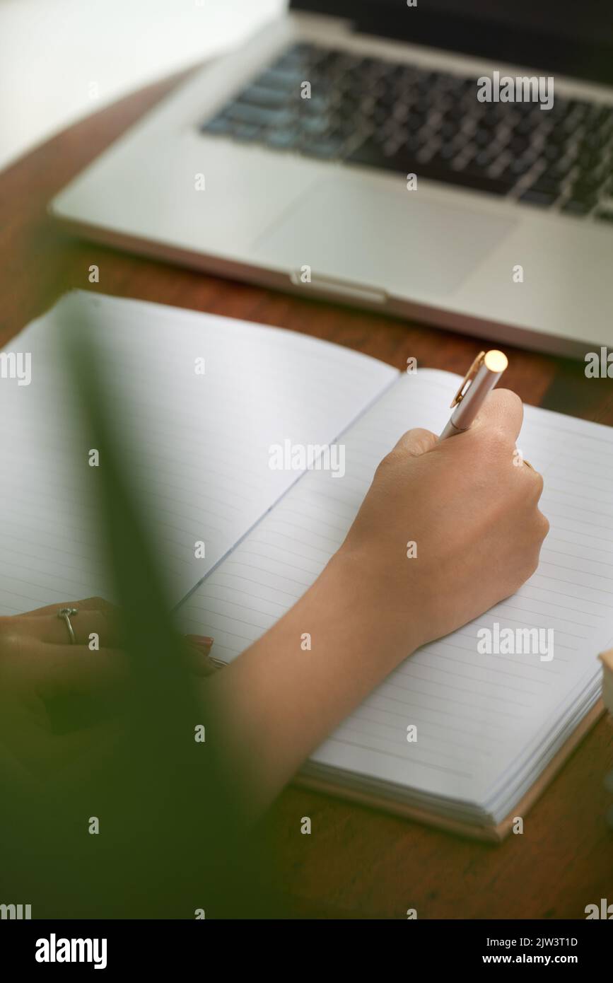 Female hands writing in notepad hi-res stock photography and images - Alamy