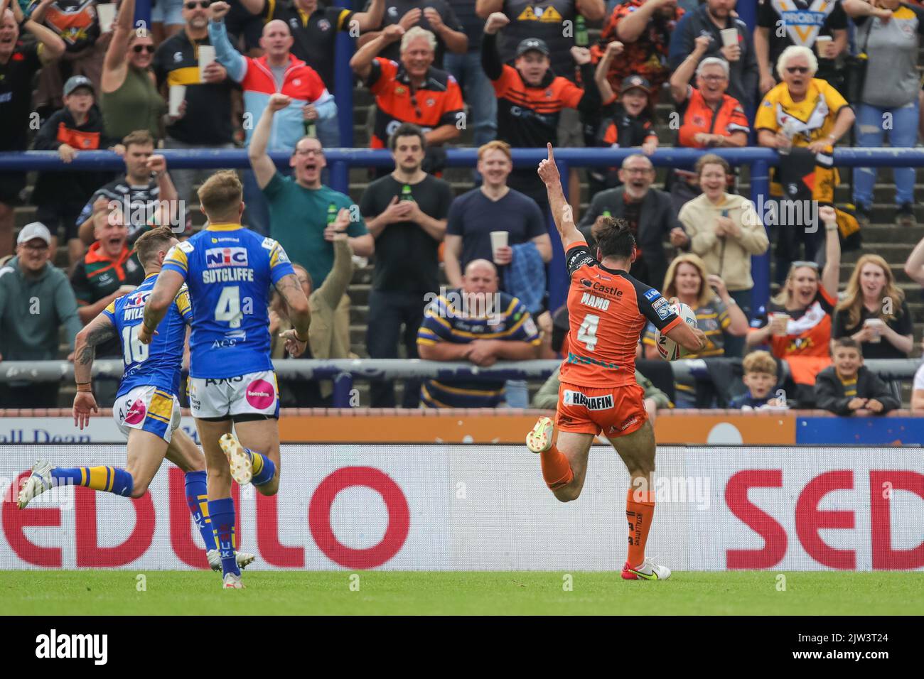 Jake Mamo #4 of Castleford Tigers points to the fans as he goes over ...