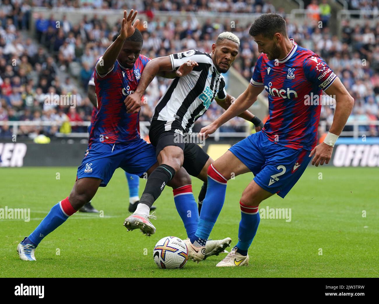 Crystal Palace's Cheick Doucoure (left), Newcastle United's Joelinton ...