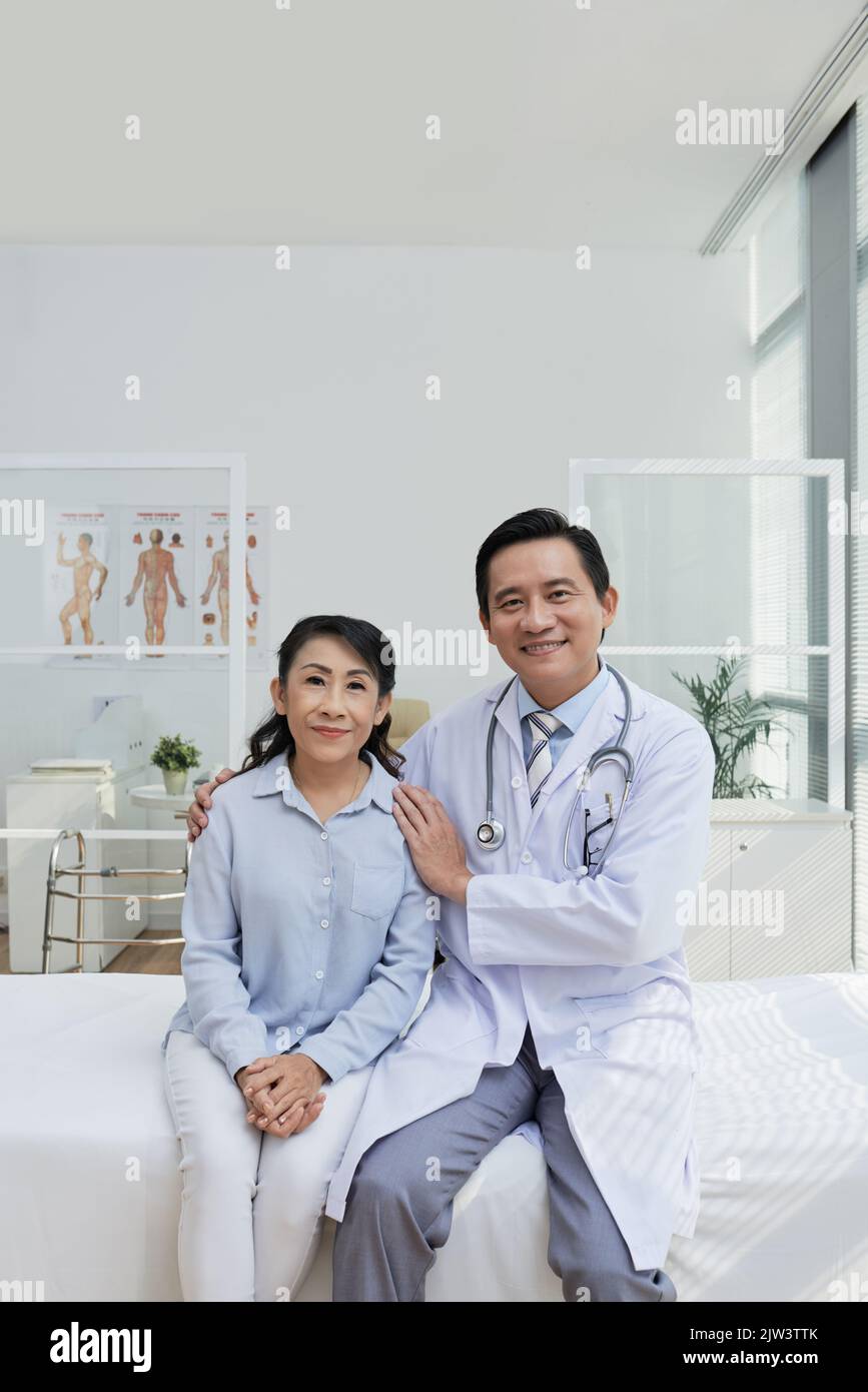 Asian doctor patient hugging hi-res stock photography and images - Alamy