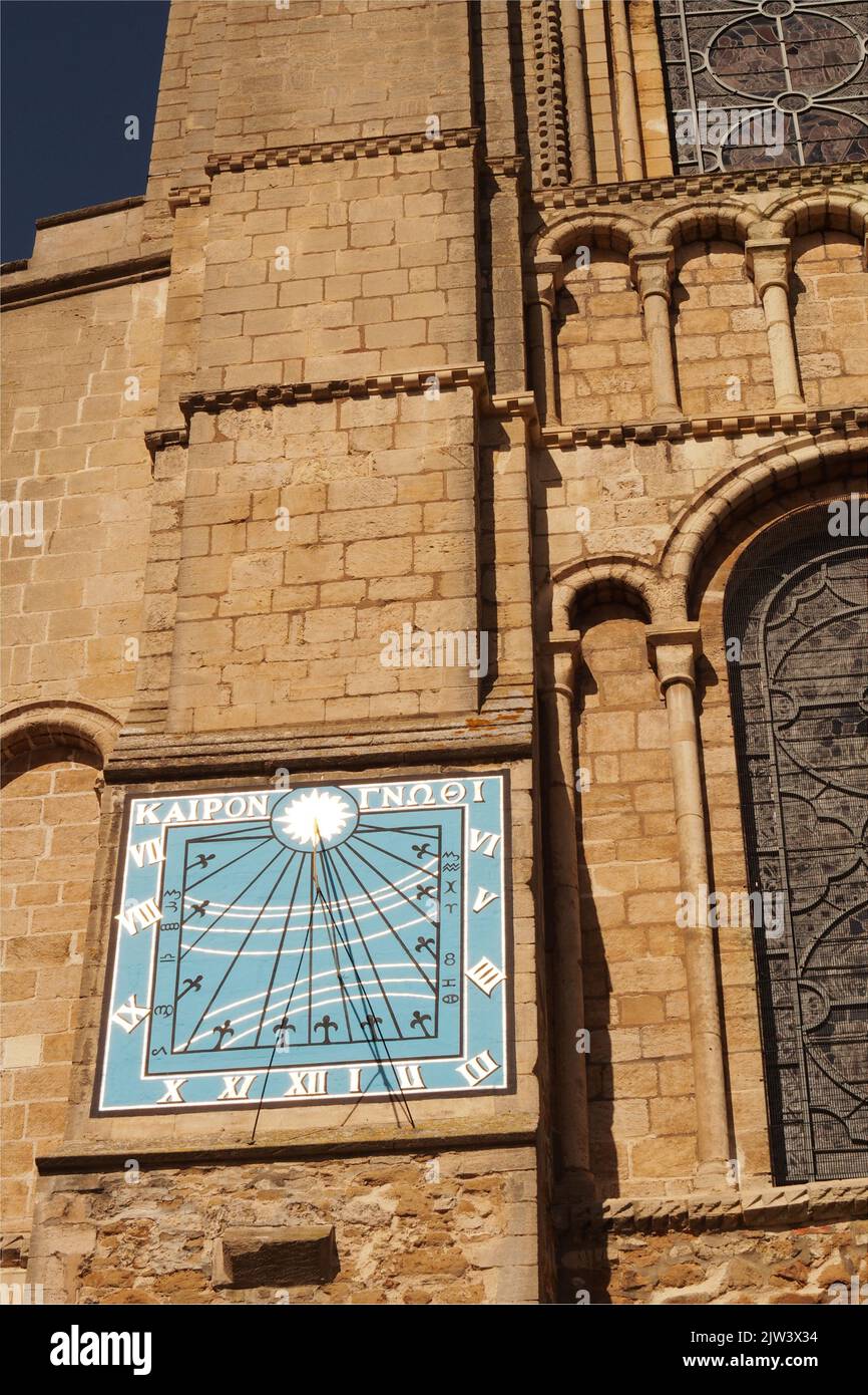 A view of the sundial on A view of some of the windows of Ely cathedral ...