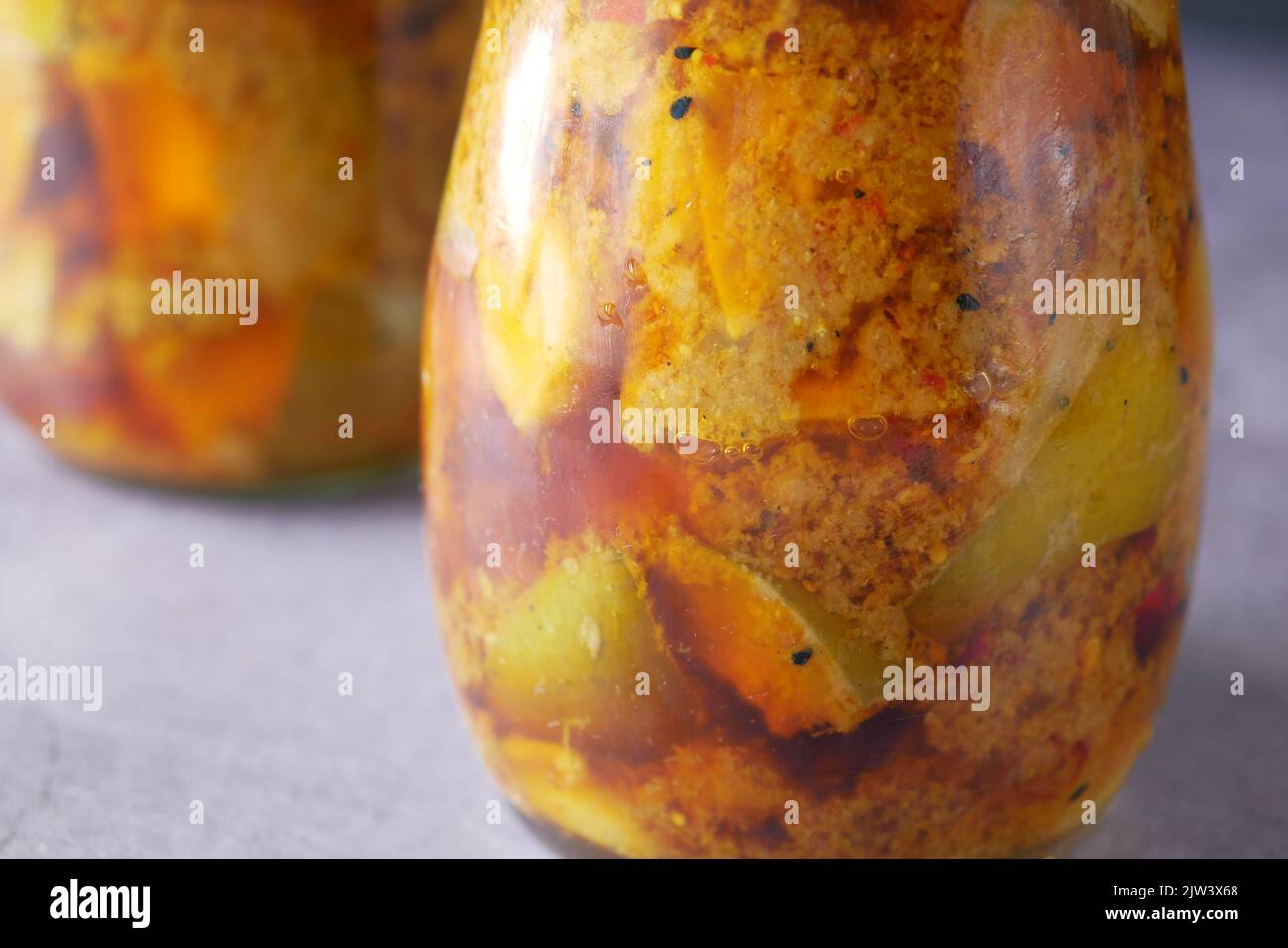 Homemade Mango Pickle in a glass jar on table Stock Photo - Alamy