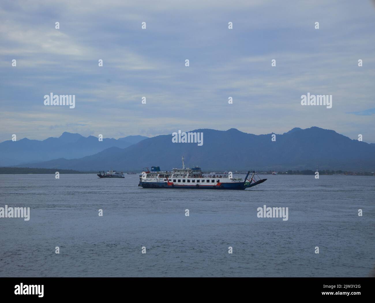 A passenger ferry is crossing the Bali Strait Stock Photo - Alamy