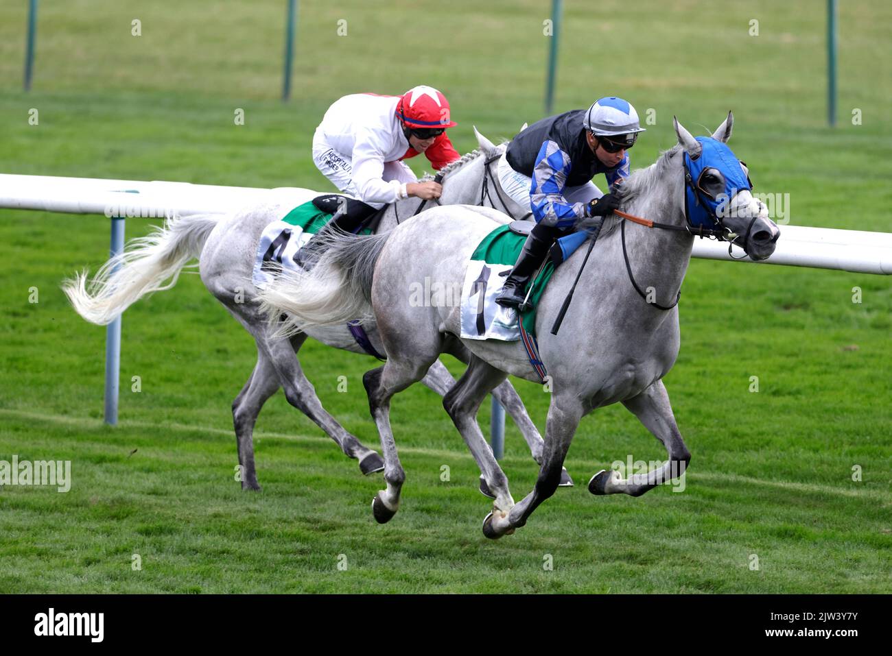 Bayan Athbah ridden by jockey Tadhg O'Shea (right) wins the HH Sheikha ...