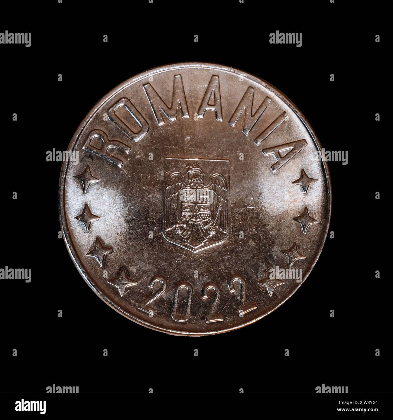 The back of Romanian Bani coin isolated on a black background Stock ...