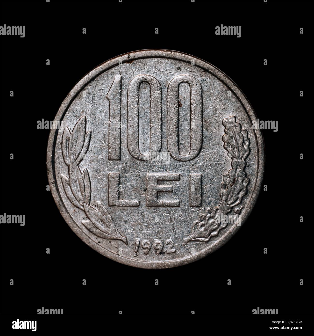 A Romanian 100 Lei coin isolated on a black background Stock Photo - Alamy