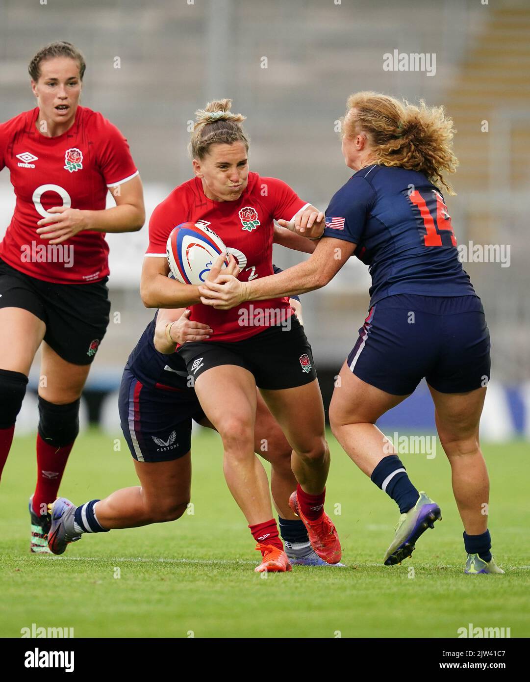 England's Claudia MacDonald gets away from USA's Gabby Cantorna and ...