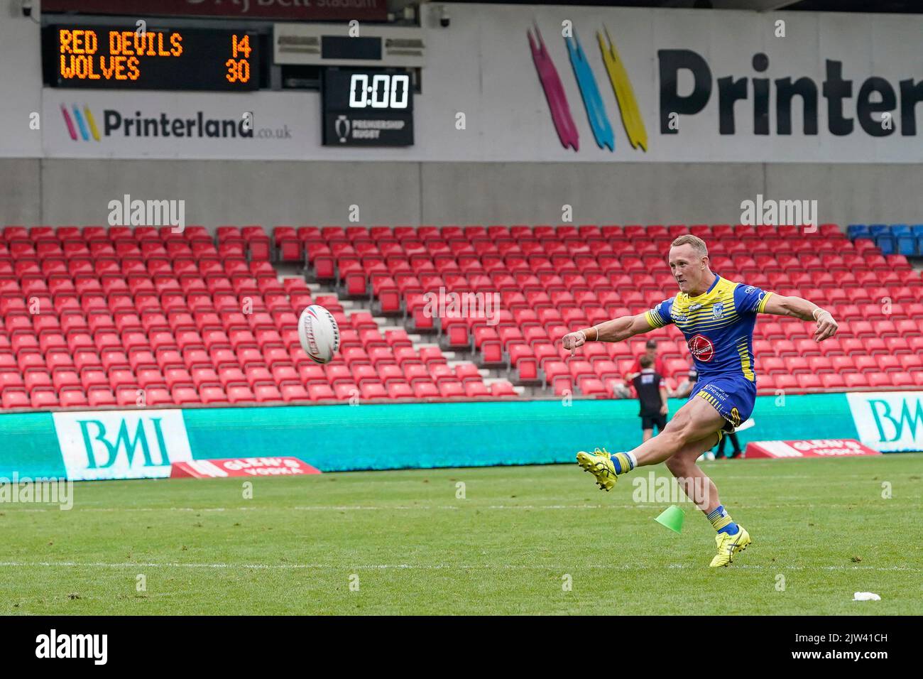 Jason Clark #14 of Warrington Wolves kicks the final conversion in his ...