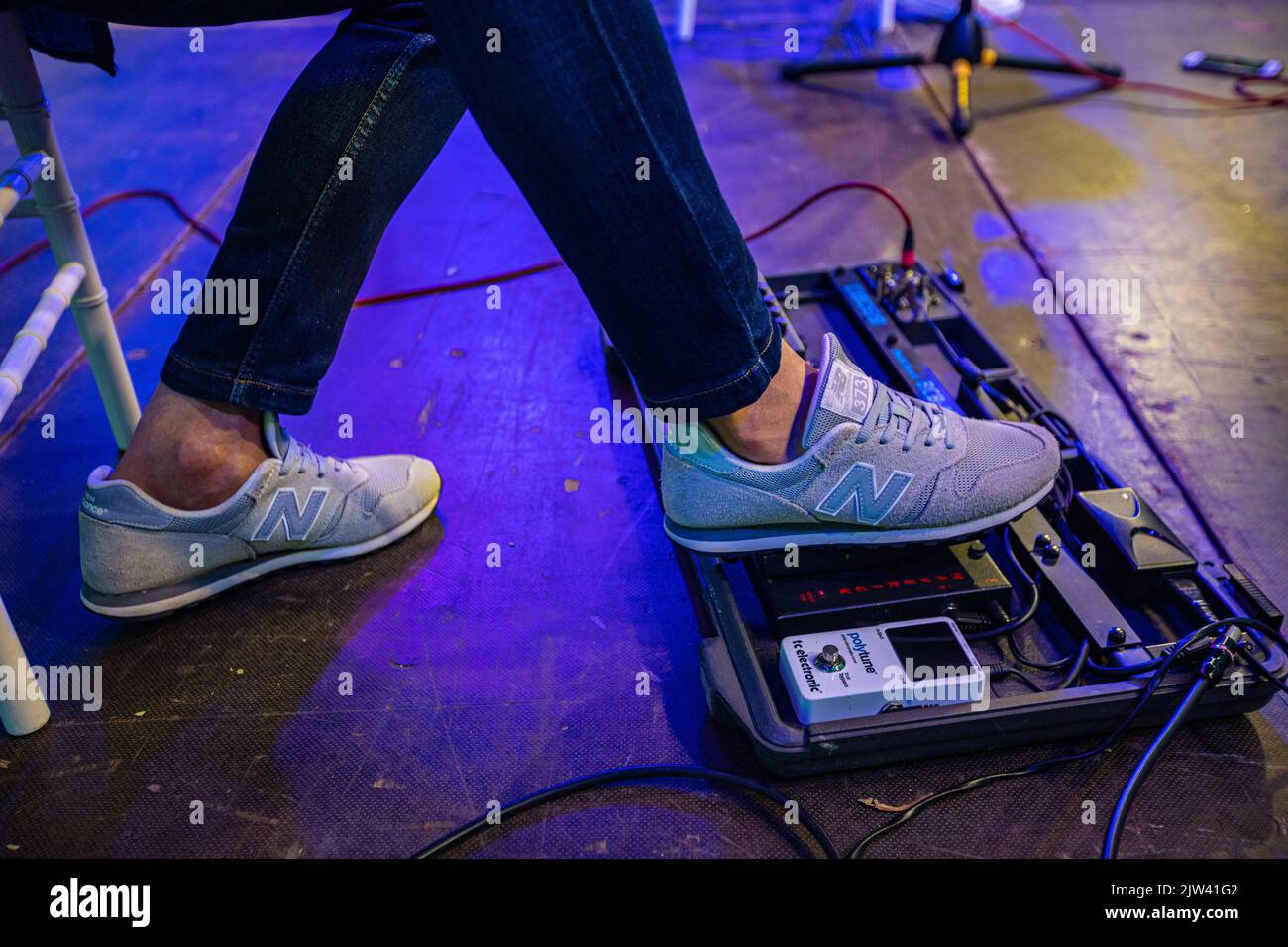 Lviv, Ukraine - May, 2021: Foot wearing New Balance sneakers pressing ...