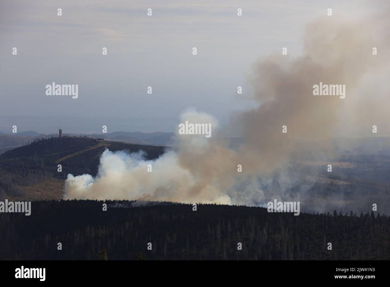 Harz, Germany. 03rd Sep, 2022. Columns of smoke rise from the Brocken ...