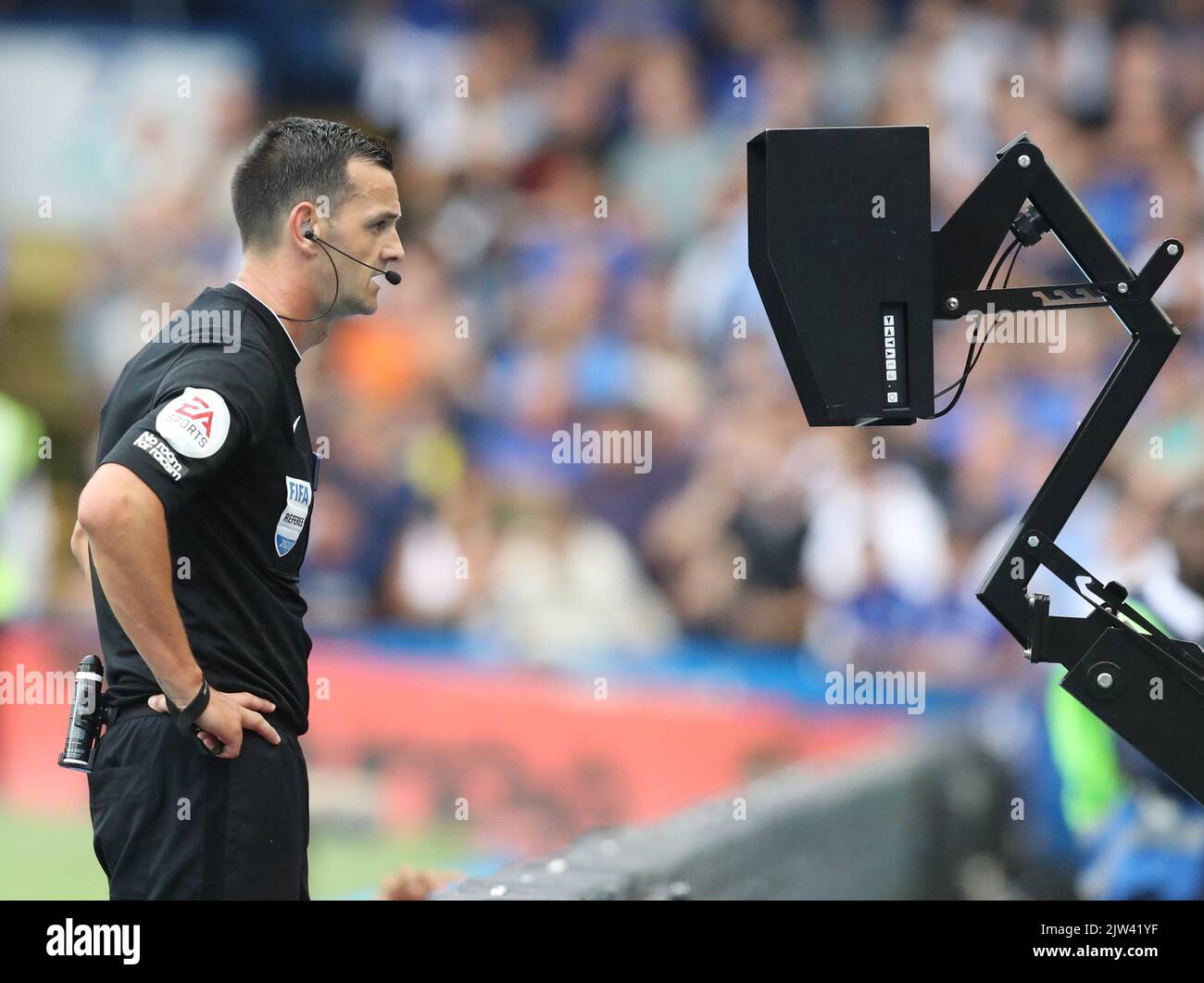 London, England, 3rd September 2022. Referee Andrew Madley checks the ...