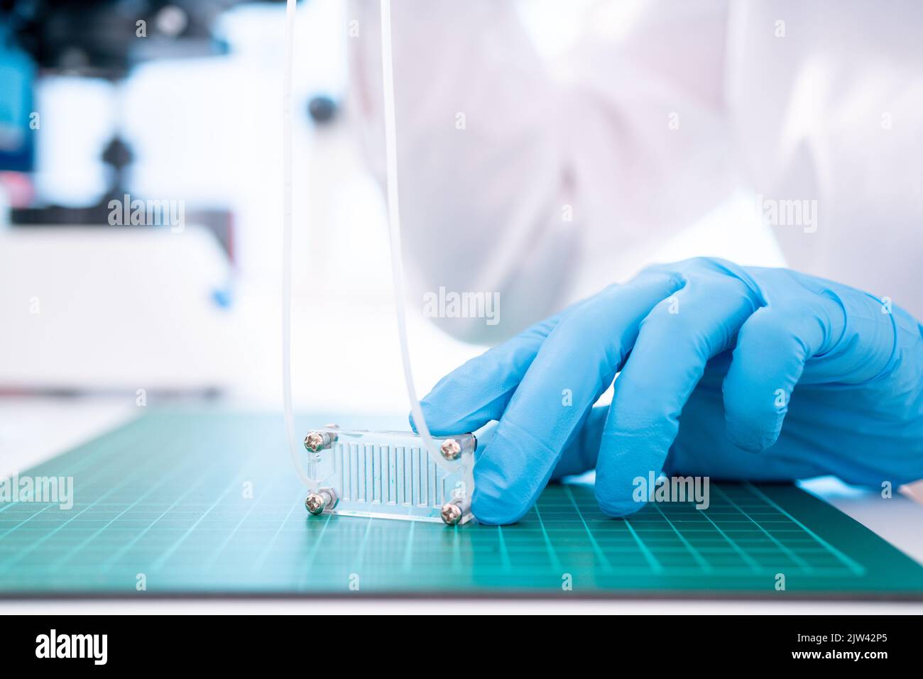 Organ-on-a-chip (OOC) - microfluidic device chip that simulates ...