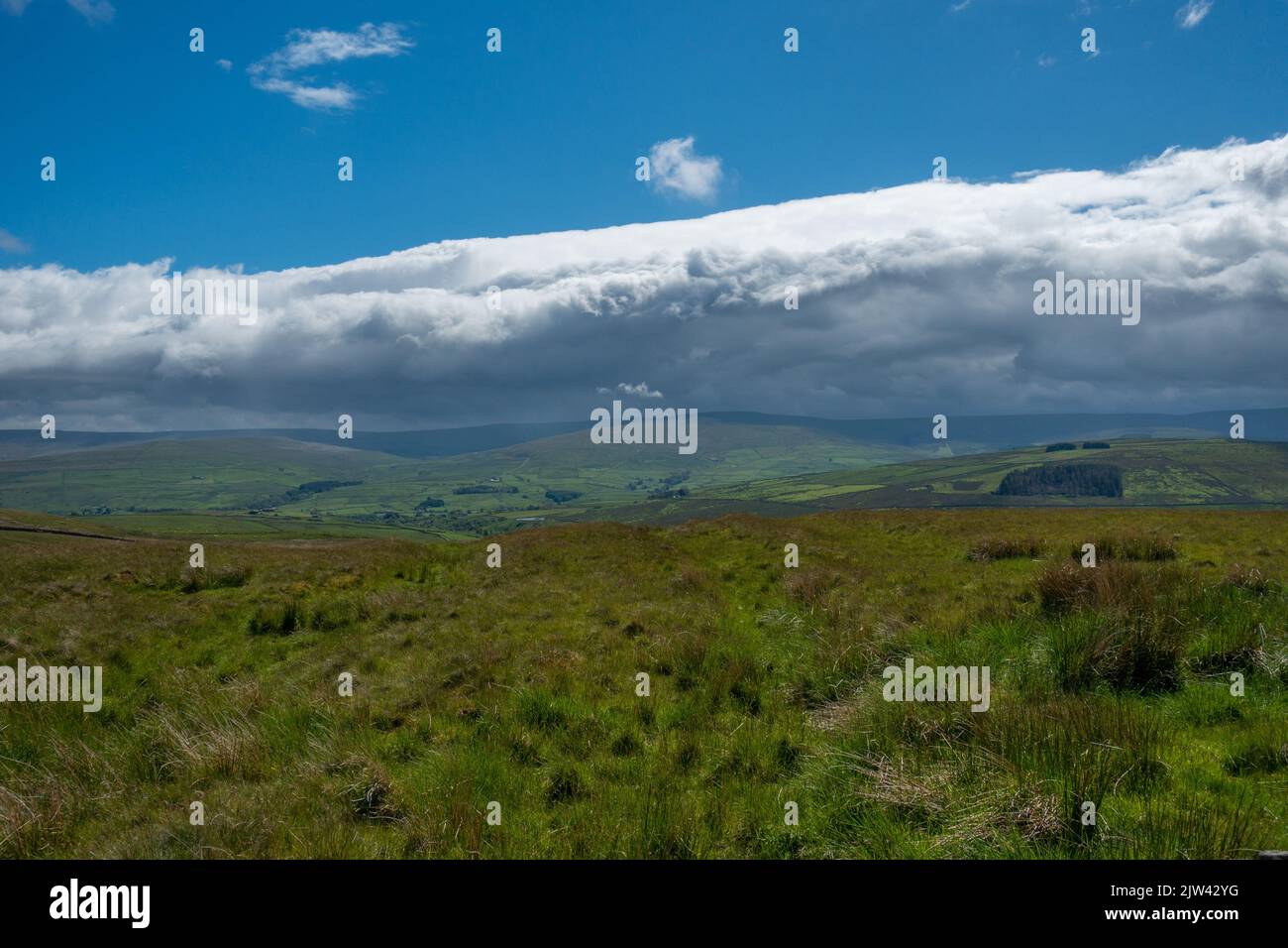 Stunning view into a sunlit Weardale valley from Chapel Fell with blue ...