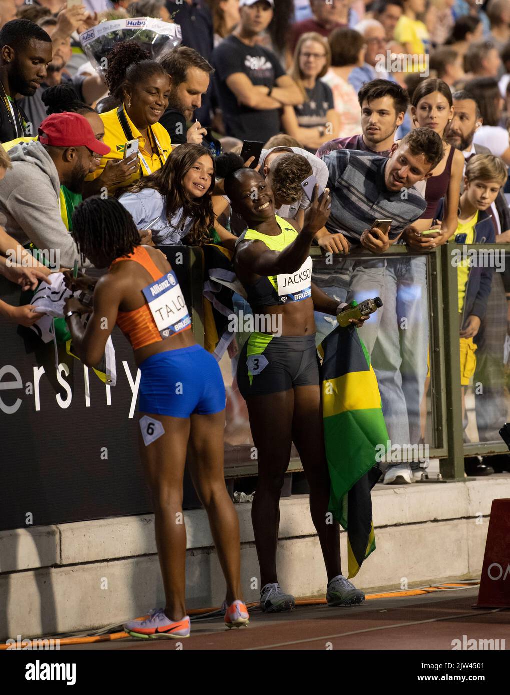 Shericka Jackson of Jamaica has a selfie with fans after competing in ...