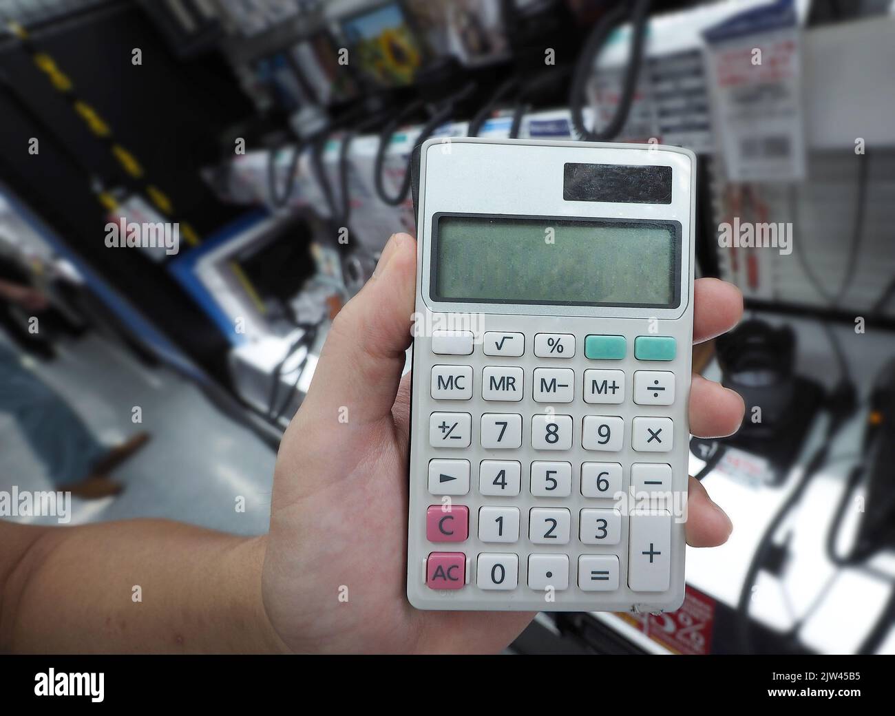 Handy calculation hi-res stock photography and images - Alamy
