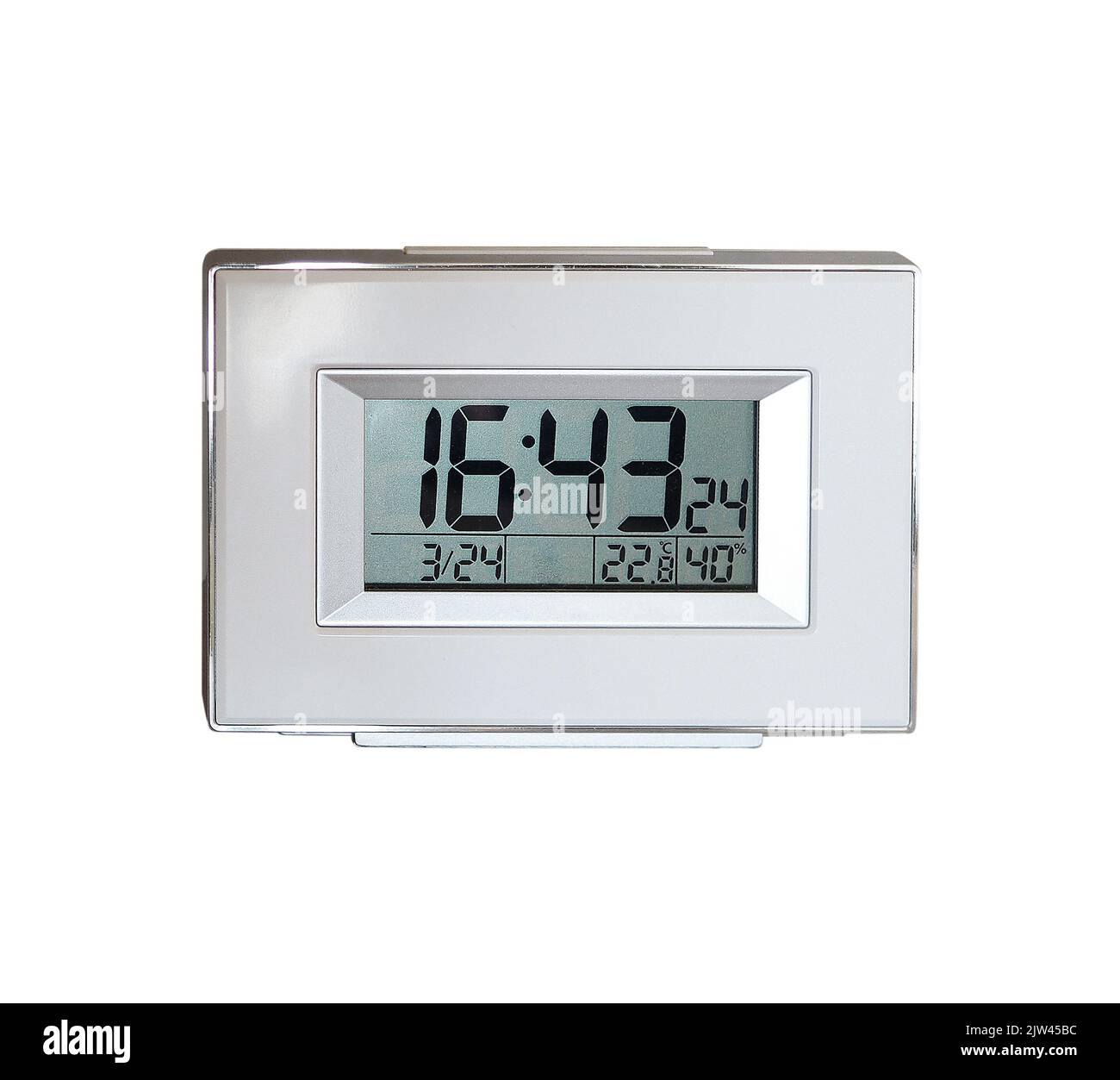 Silver color digital clock made from plastic material and white ...