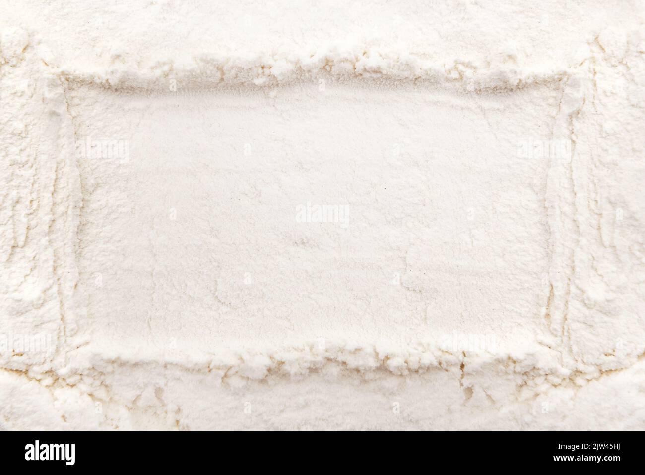 Background from wheat flour. Texture of flour with a free space in the ...