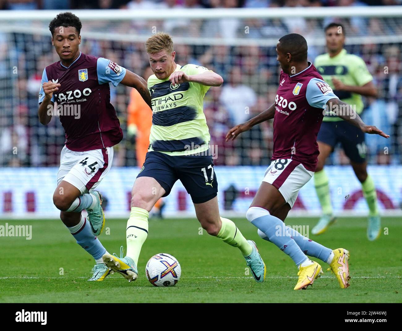 Manchester City's Kevin De Bruyne (centre) under pressure from Aston ...