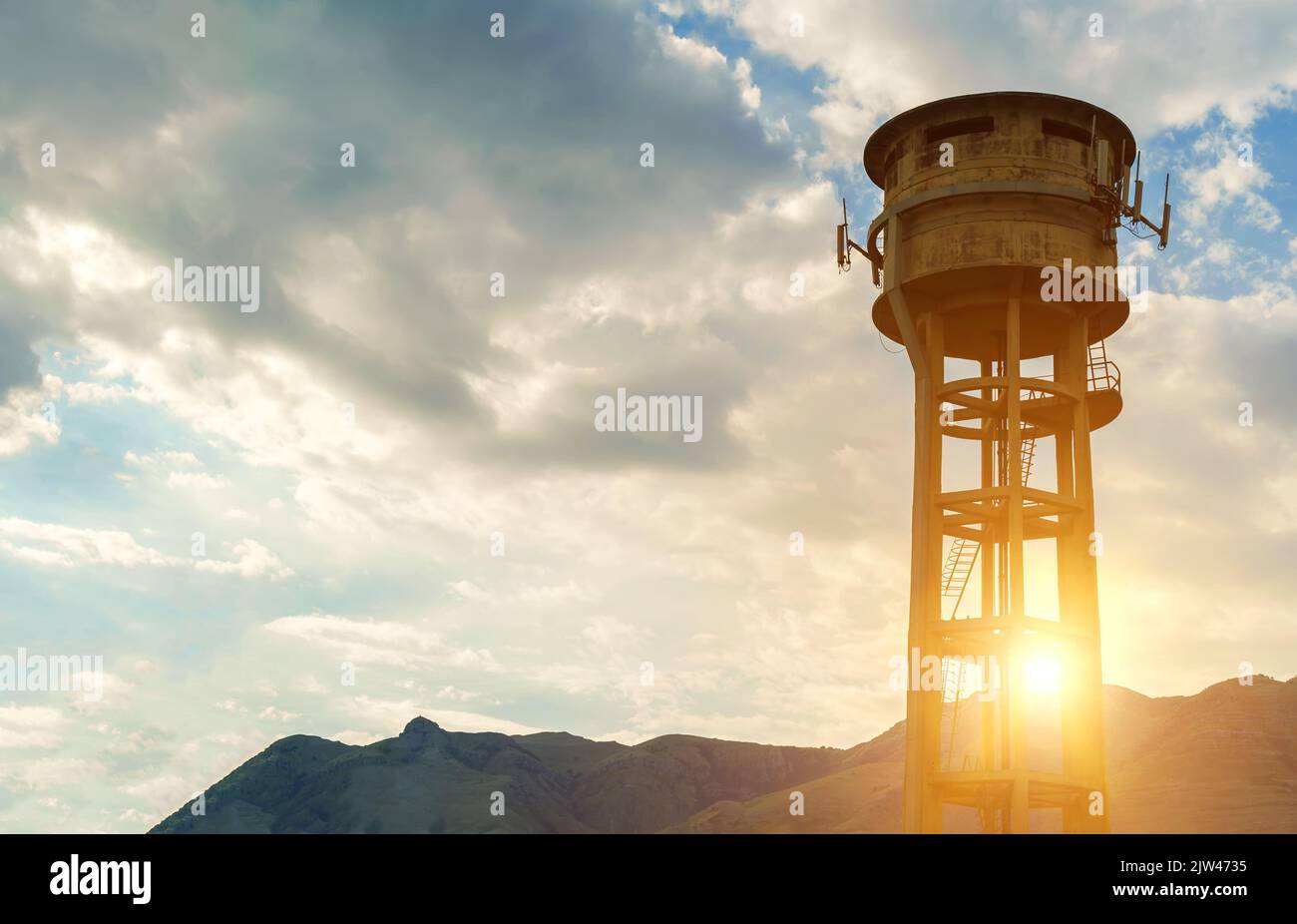Old water tower with cellular communications Stock Photo - Alamy