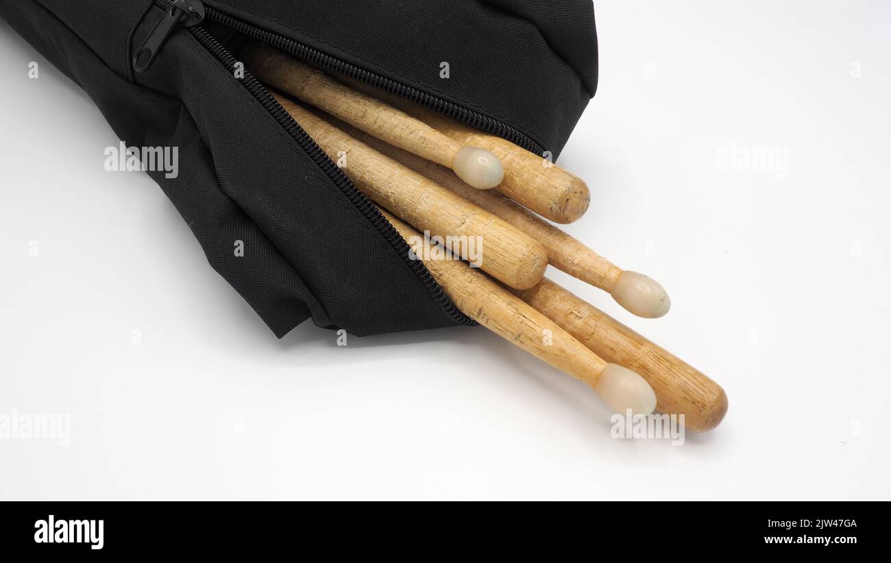 Drum sticks which made from real wood material and black color fabric ...